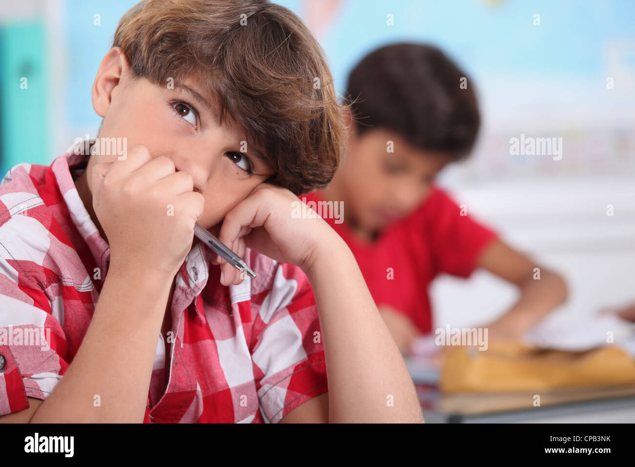 Two young children in classroom Stock Photo - Alamy