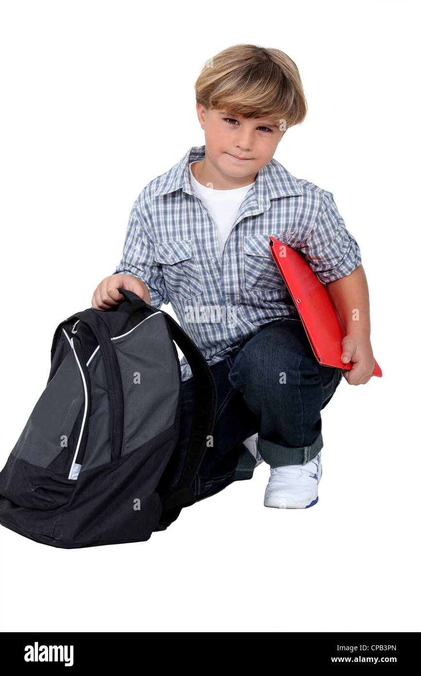 Child kneeling school hi-res stock photography and images - Alamy