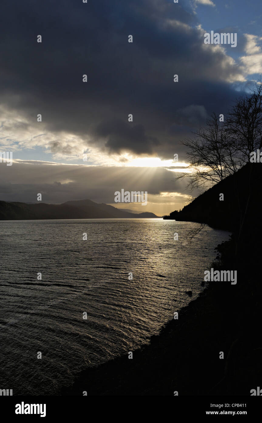 Moody sunset with dark clouds looking west along Loch Ness, Scottish ...
