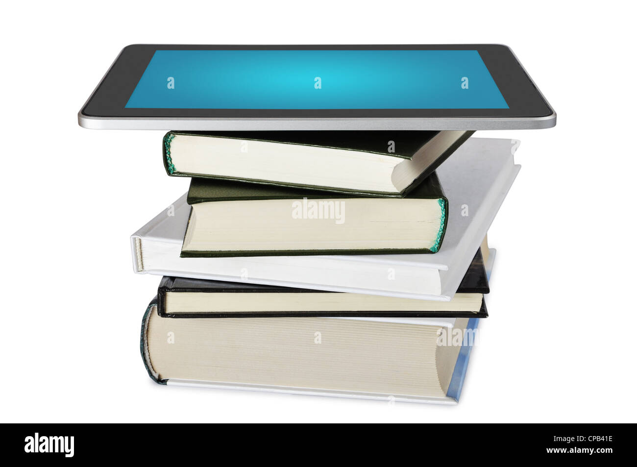 tablet pc e-book set upon a book stack isolated on white background ...
