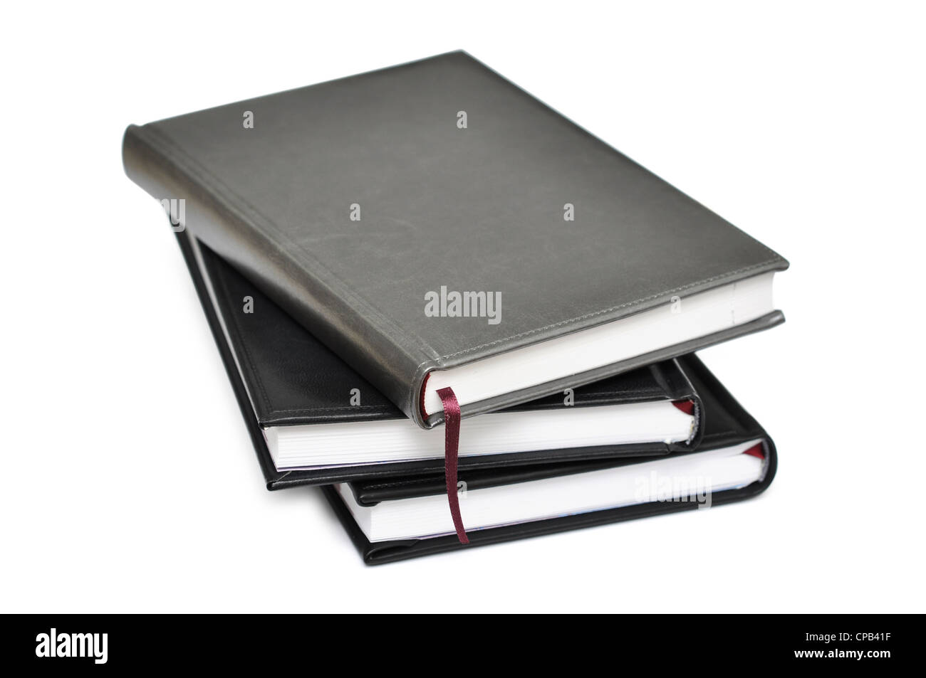 Three notebooks on white background with clipping path Stock Photo - Alamy