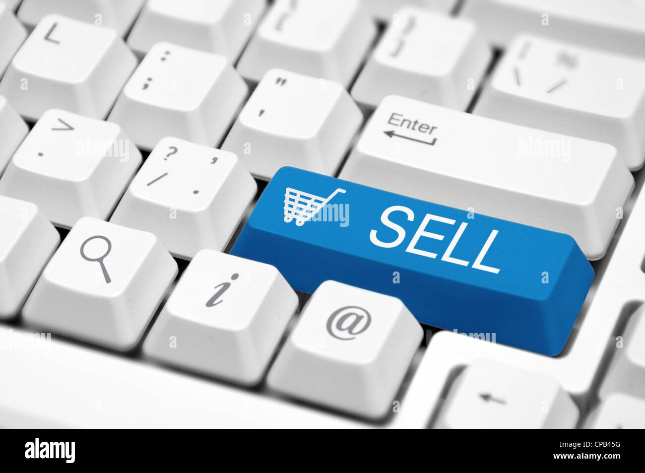 "Sell" icon button on the key of a computer keyboard Stock Photo - Alamy