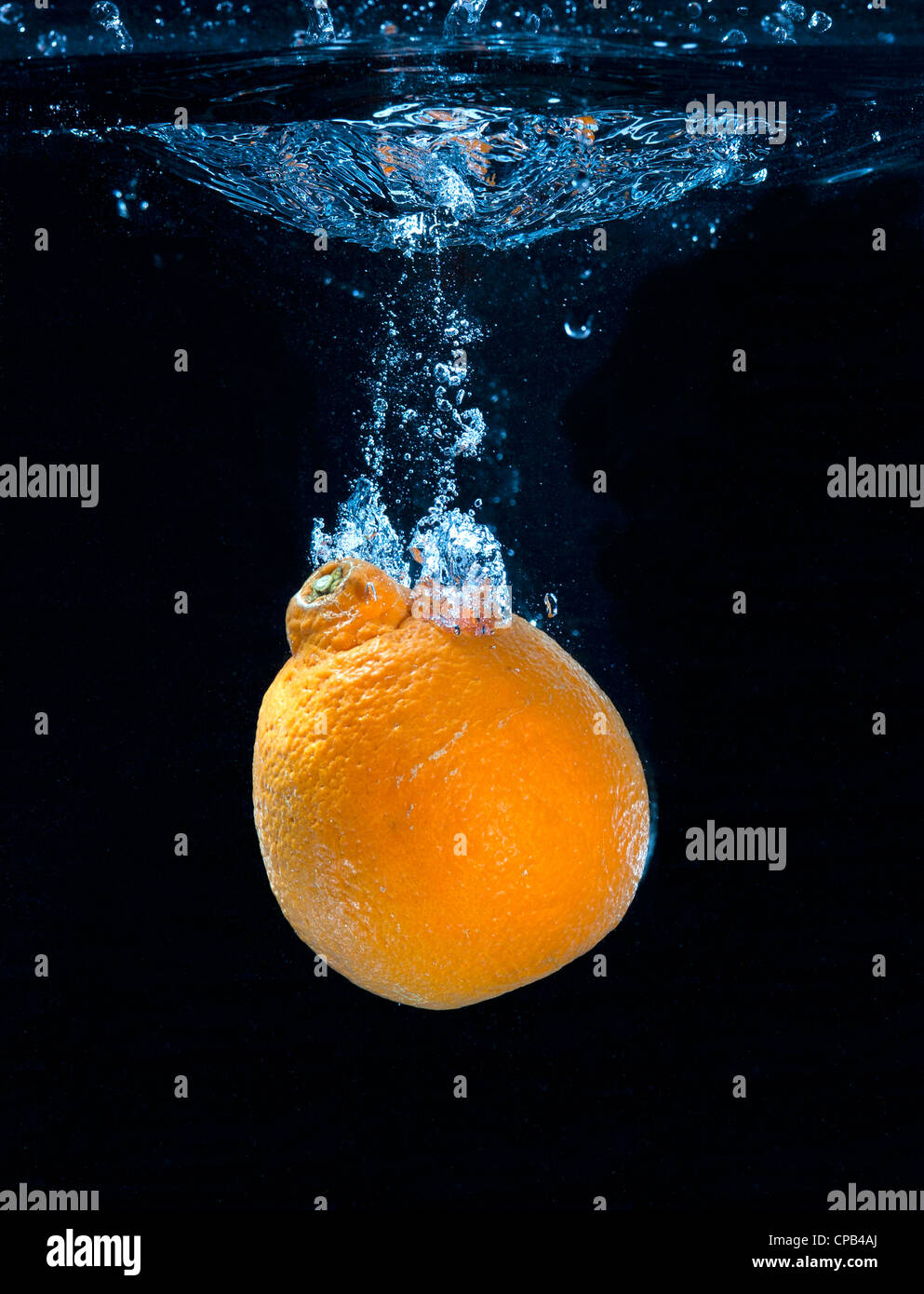 Fruit Dropped In Water With Splash High Resolution Stock Photography ...
