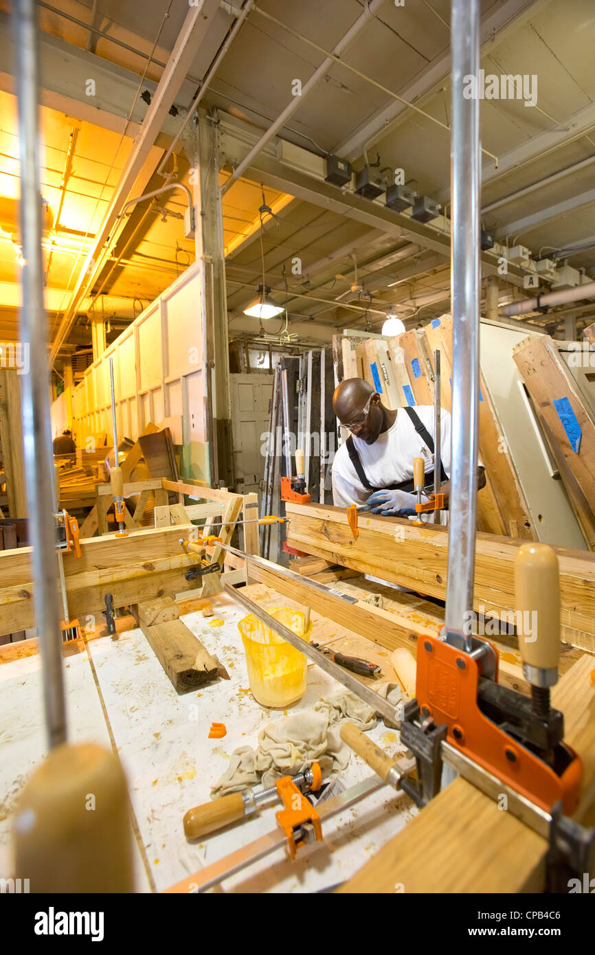 Workers Recycle Building Materials Salvaged from Deconstruction of a ...