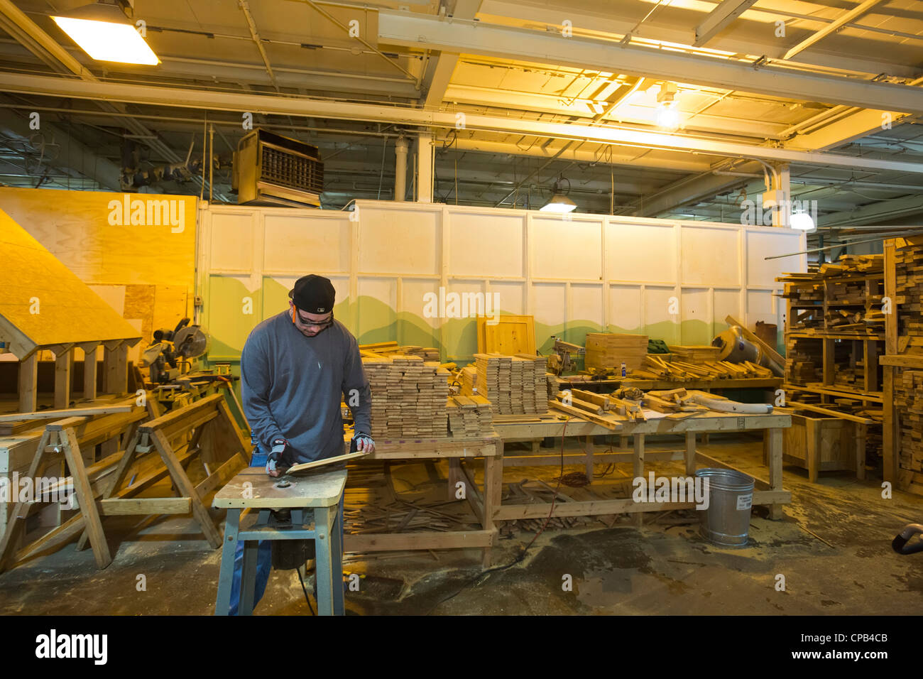 Workers Recycle Building Materials Salvaged from Deconstruction of a ...