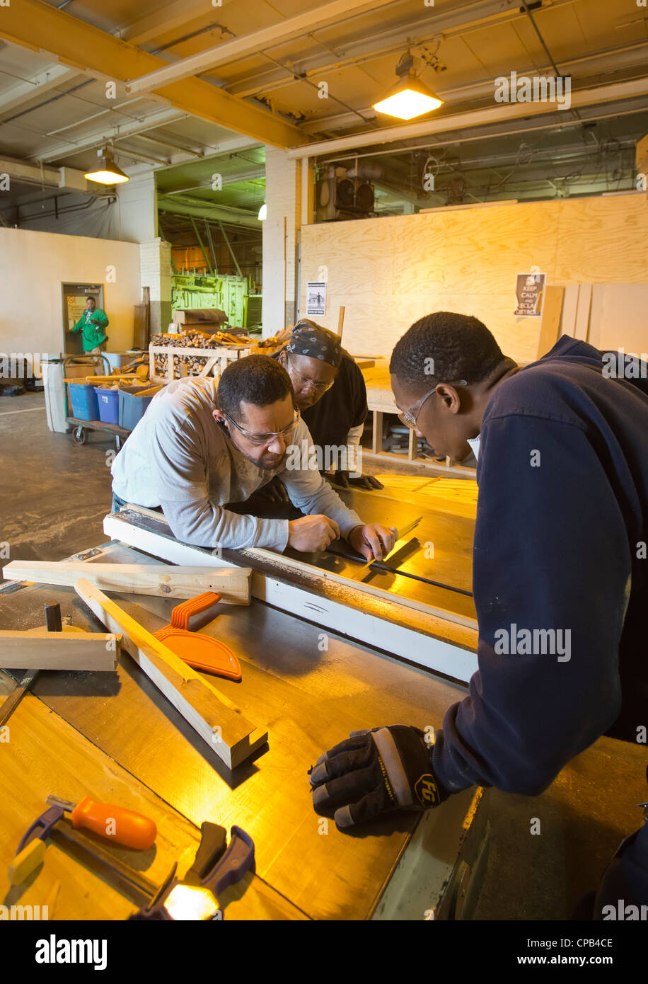 Workers Recycle Building Materials Salvaged from Deconstruction of a ...