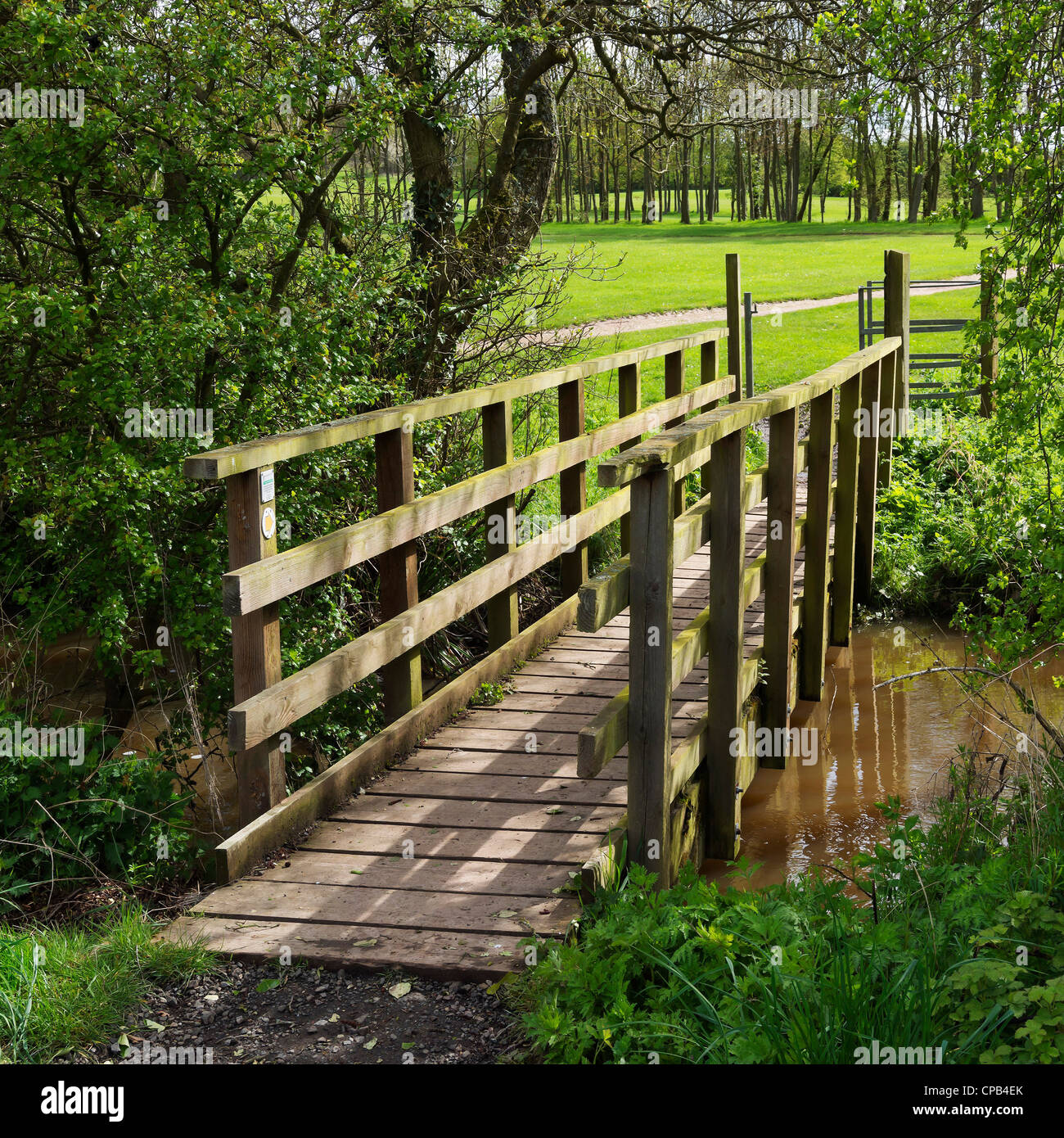 Metal footbridge over stream hi-res stock photography and images - Alamy