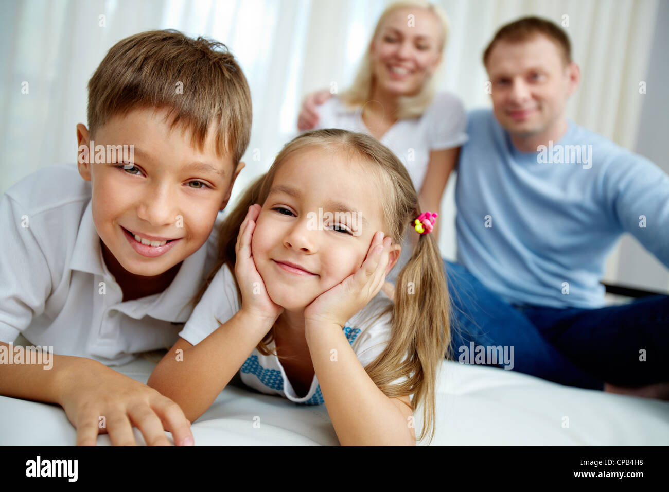 Portrait of friendly brother and sister looking at camera Stock Photo ...