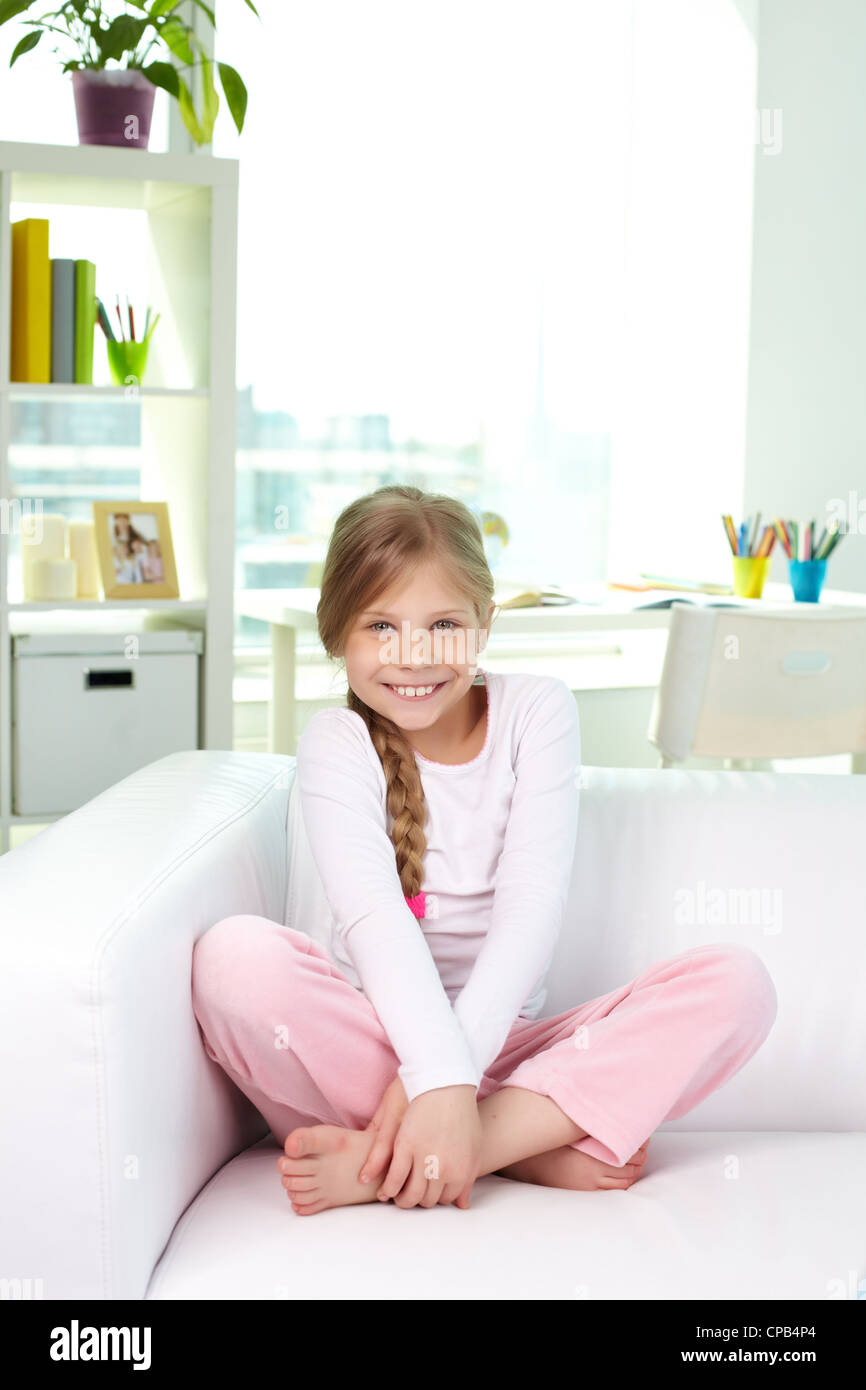 Girl on sofa Stock Photo - Alamy