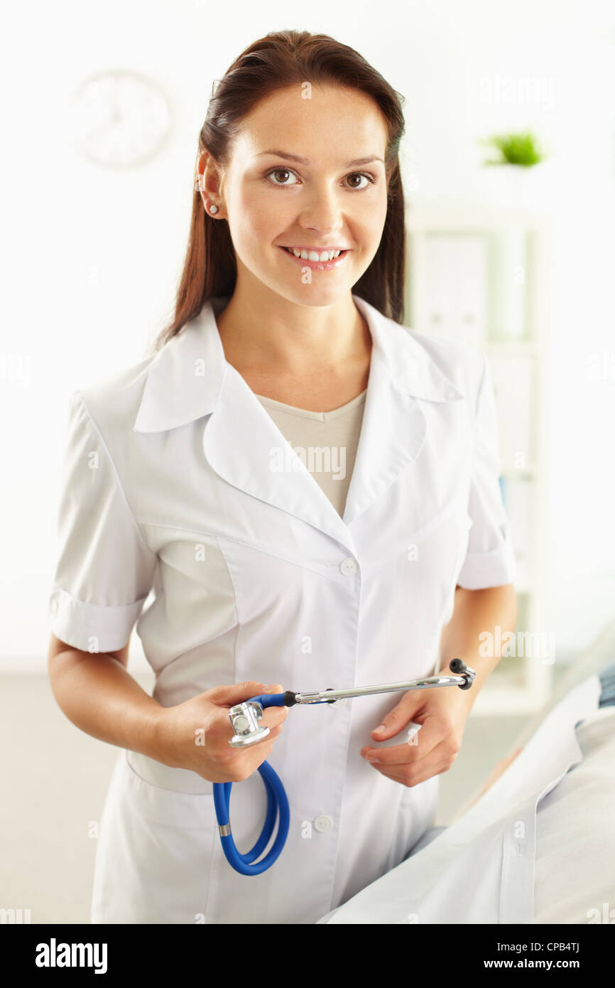 Portrait of confident female doctor looking at camera in hospital Stock ...