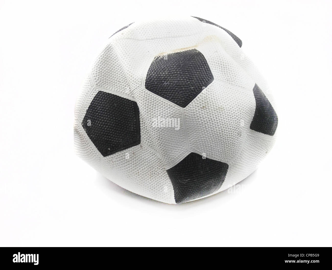 old deflated soccer ball Stock Photo - Alamy
