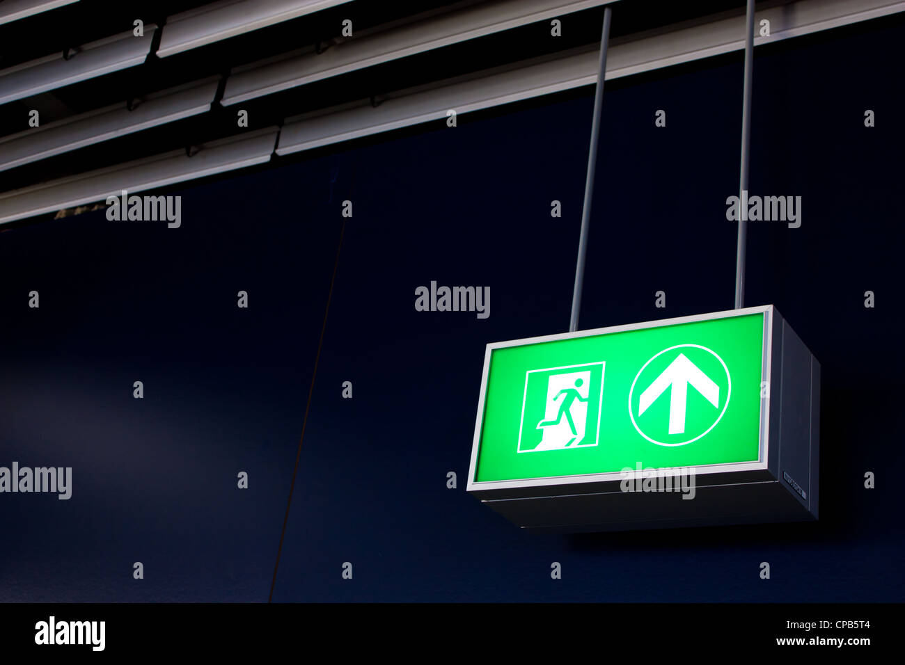 Emergency exit sign in modern offices inside an industrial plant Stock ...