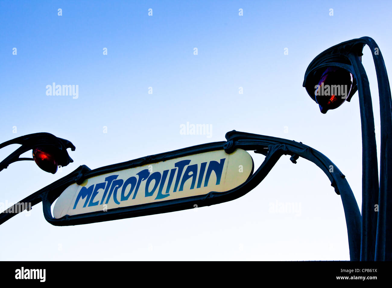 Traditional entrance sign of metro station in Paris. Clean sky in ...
