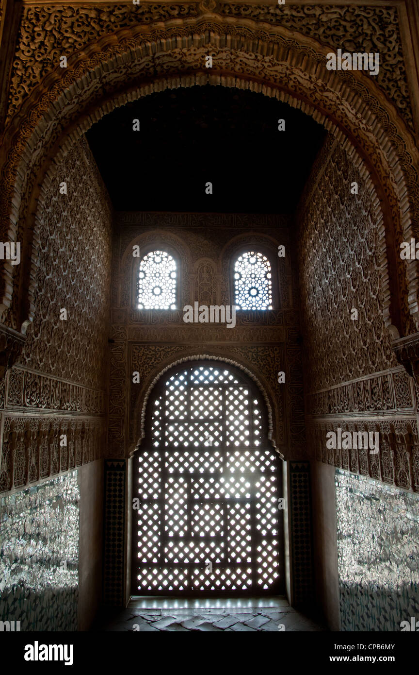 Ornately decorated reliefs surround arched windows in the Nasrid ...