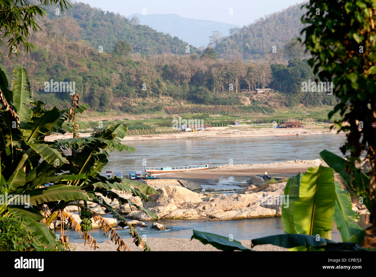 At Luang Prabang, the confluence between the Mekong and the Khan river ...