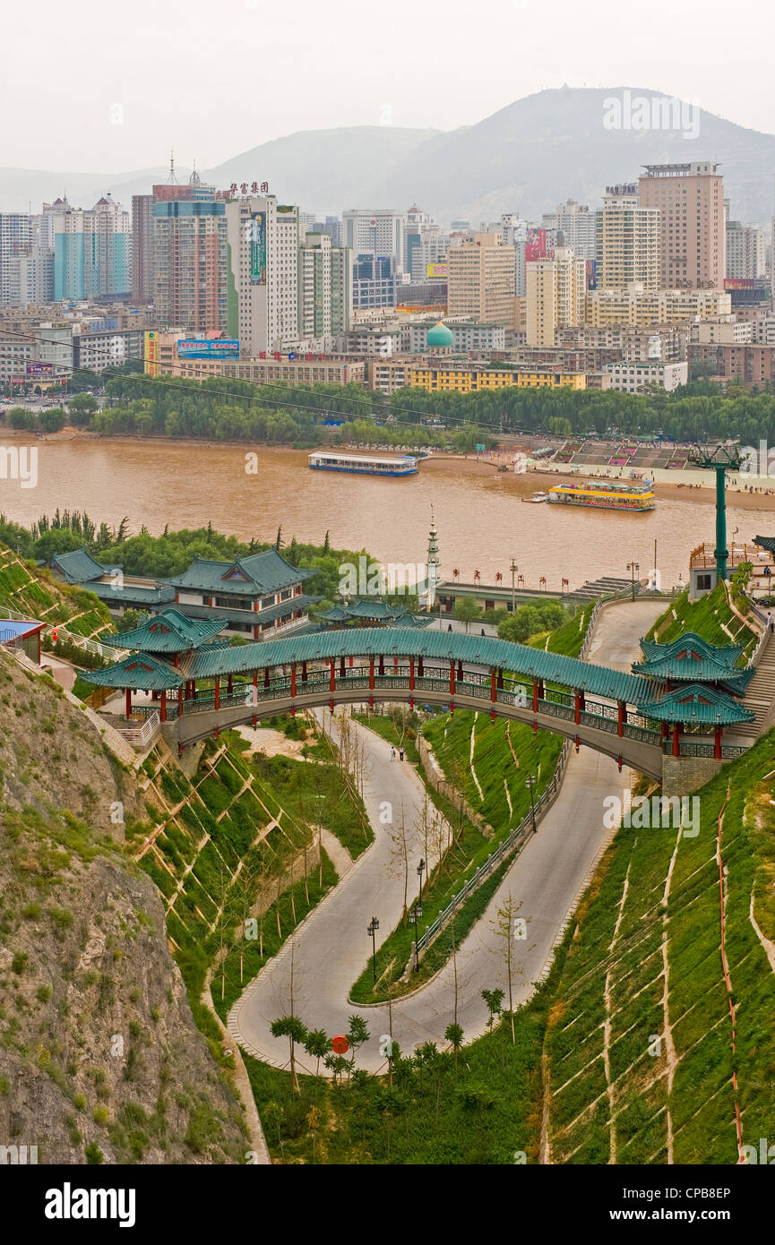 A view over Lanzhou from Baitashan Park with the Yellow river and ...