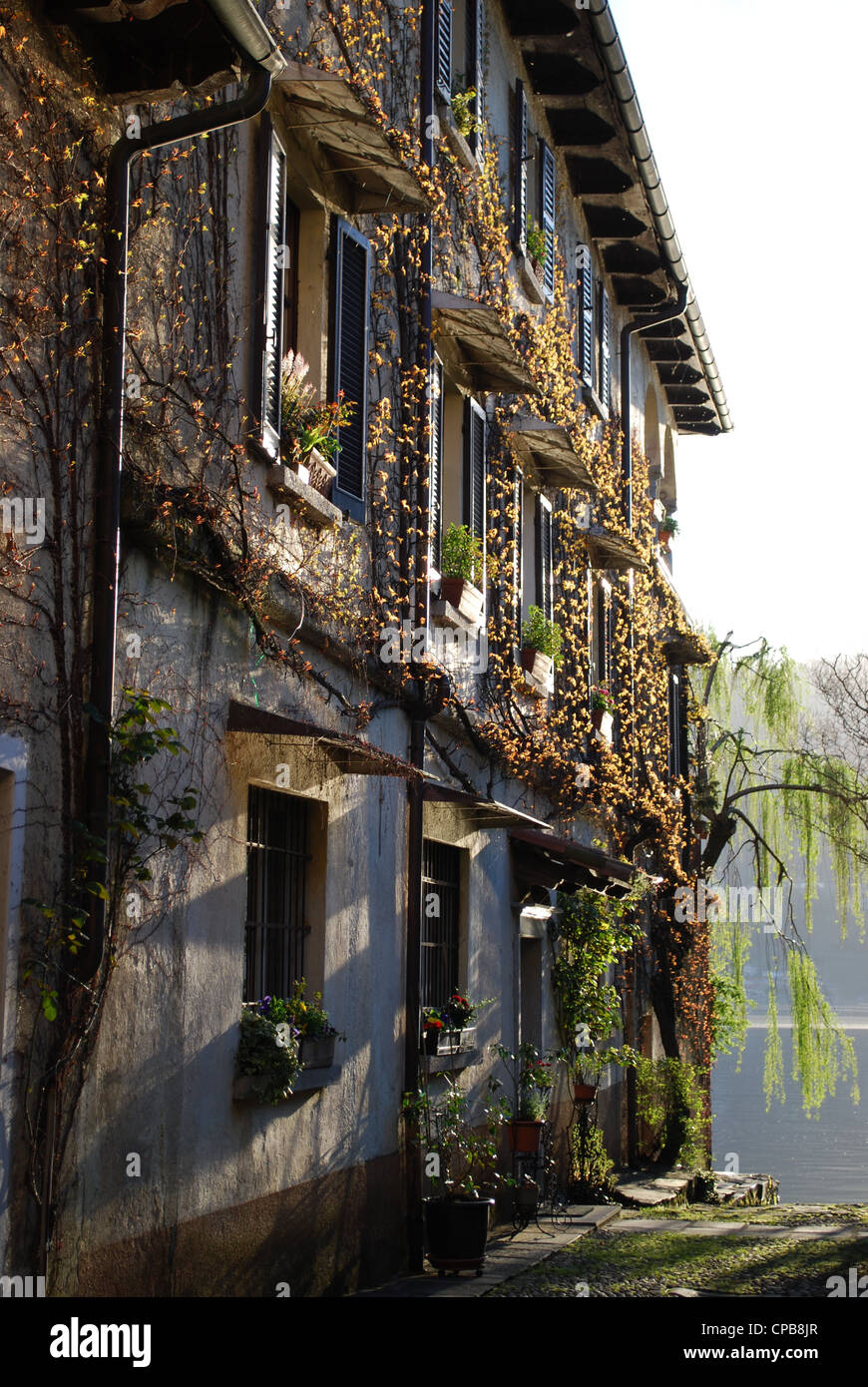 Ancient house at sunset on Orta lake, Orta St. Giulio, Piedmont, Italy ...