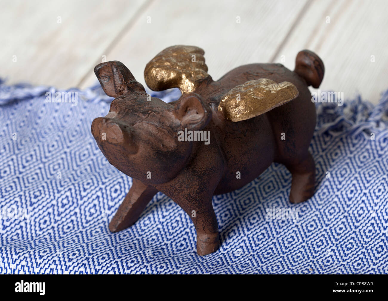 bronze pig with golden wings Stock Photo - Alamy