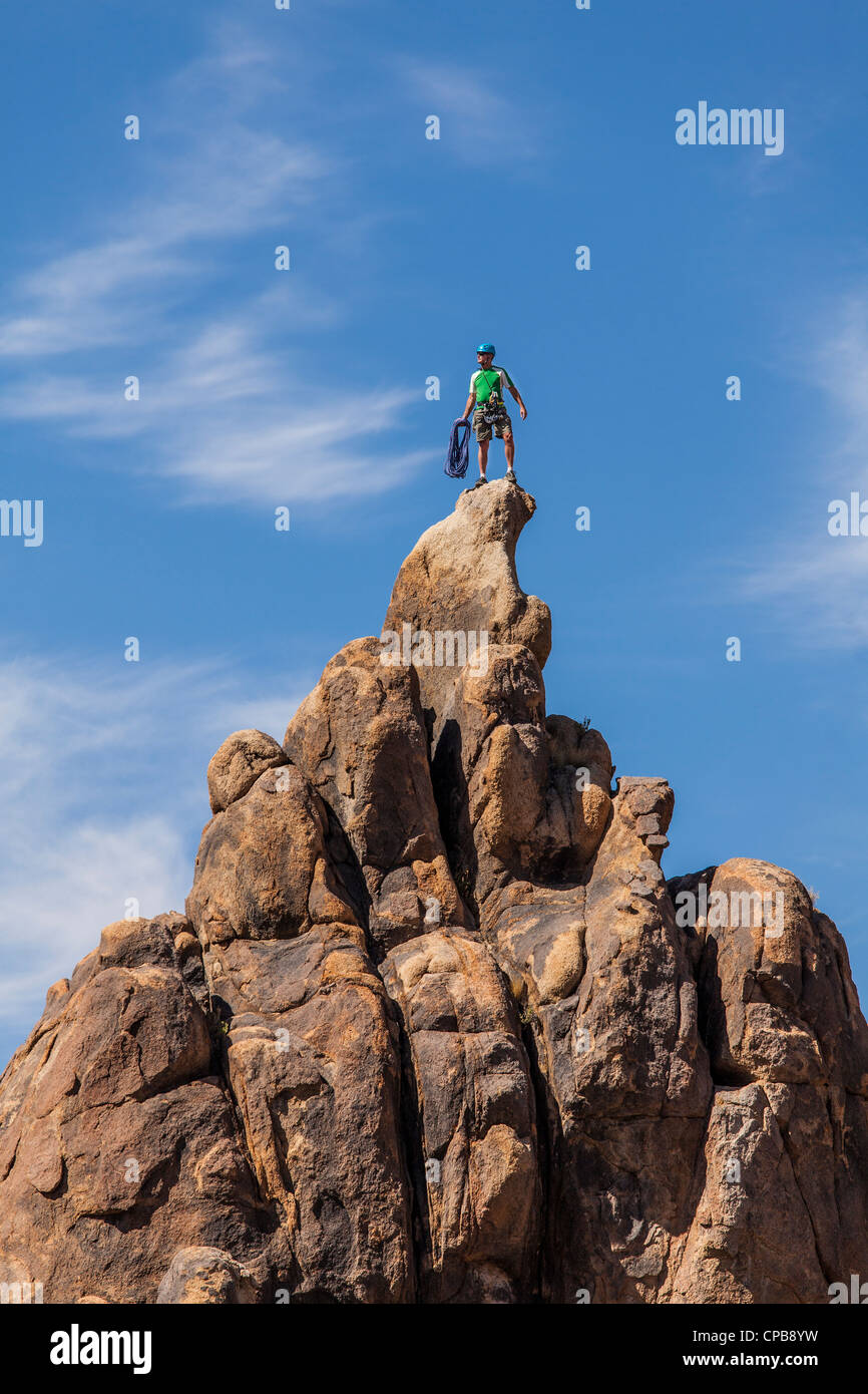 Rock climber on the summit Stock Photo - Alamy