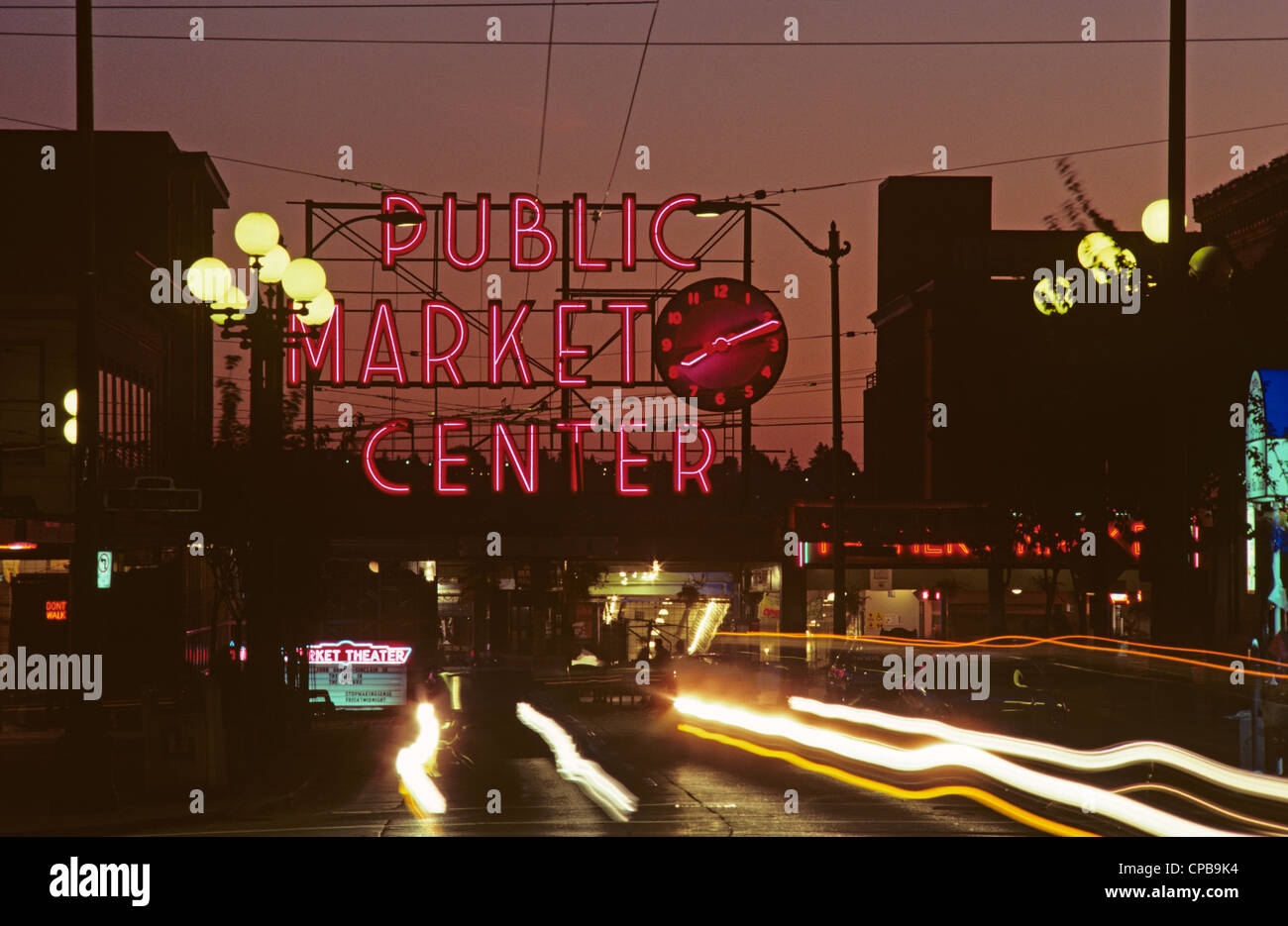 Retro Image, Sunset at the Pike Place Market with neon signs and clock ...