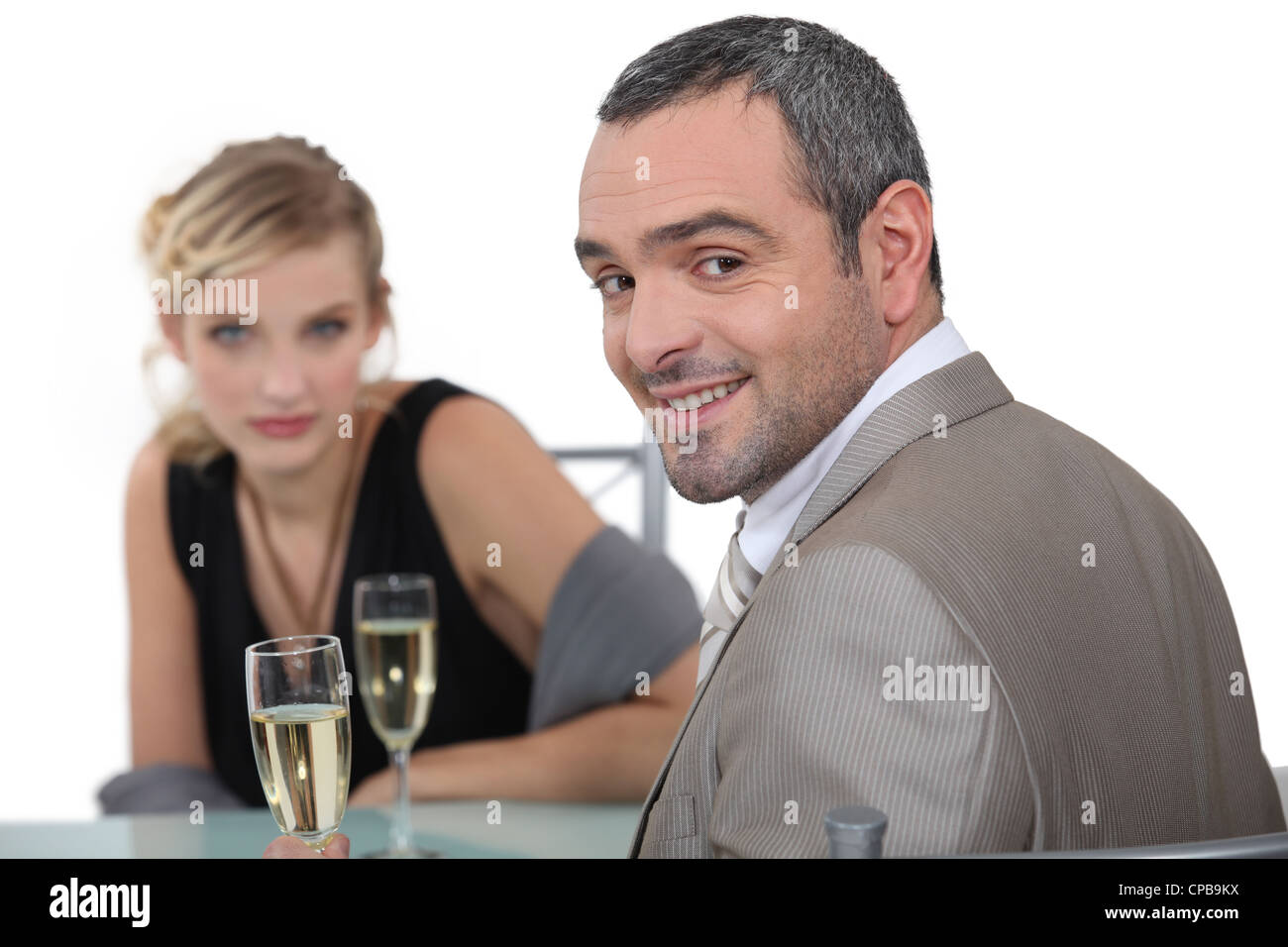 A nice couple having champagne in a restaurant Stock Photo - Alamy