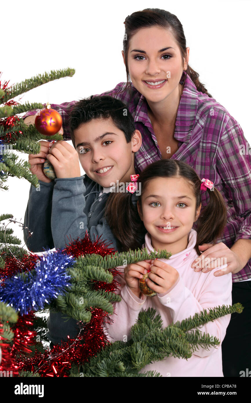 Family celebrating Christmas together Stock Photo - Alamy