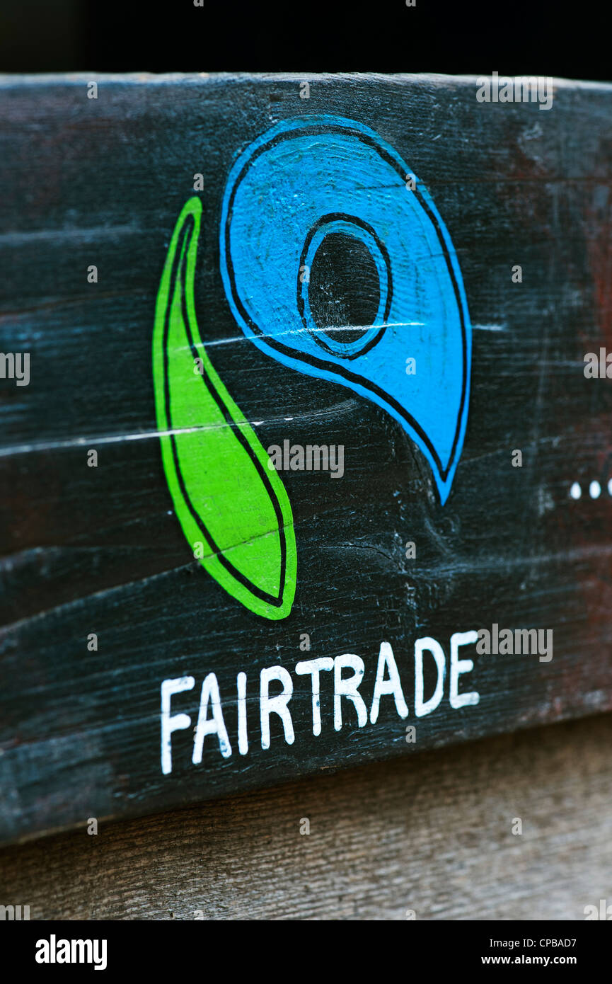 Painted Fairtrade sign on wood. UK Stock Photo - Alamy