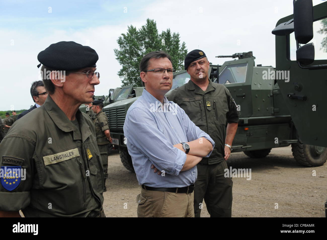Austrian Defense Minister Norbert Darabos (M) together with officers of ...