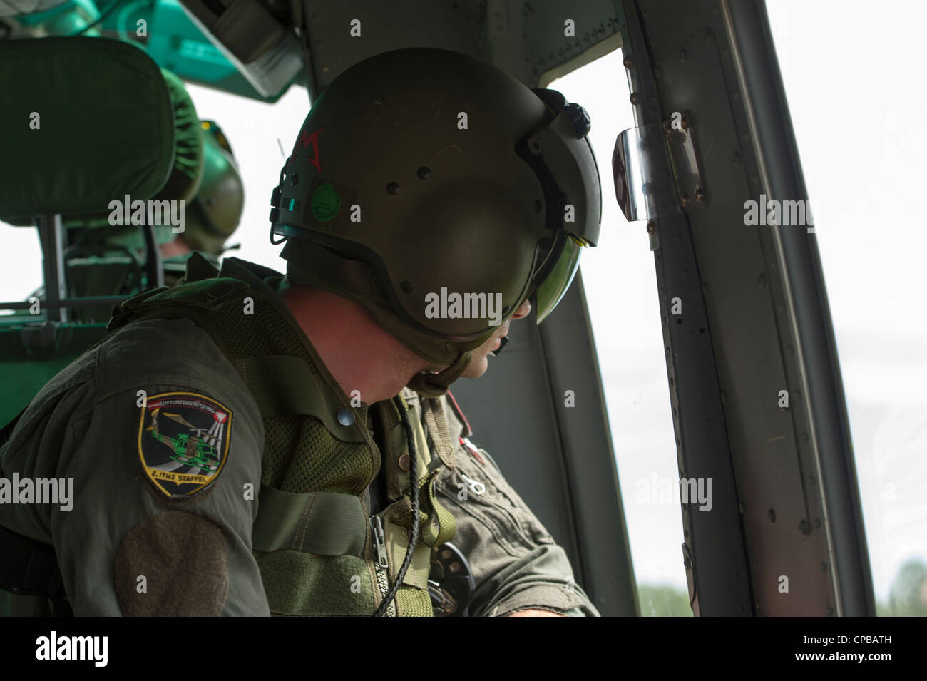 Looking from the window of a military helicopter Stock Photo - Alamy
