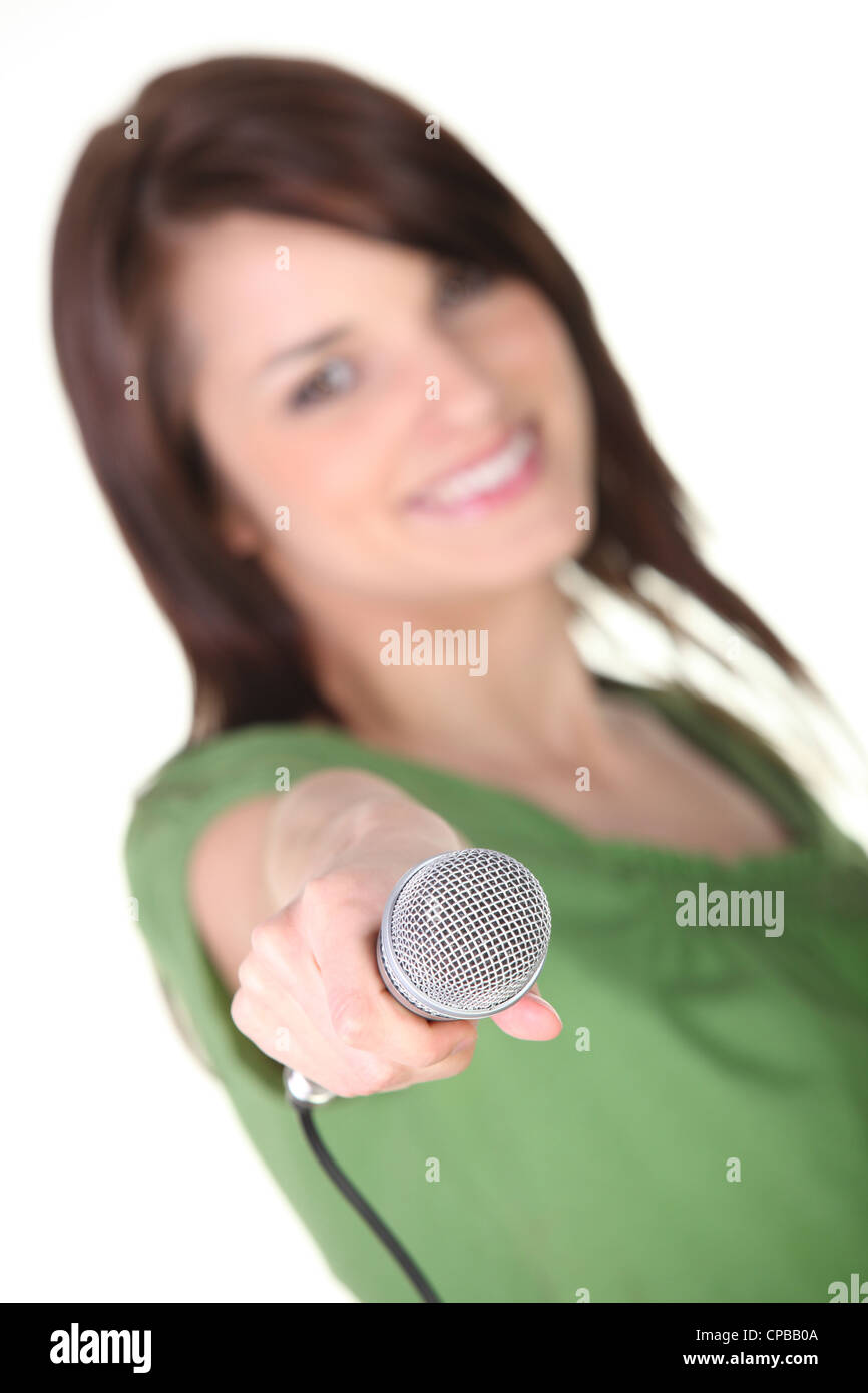 Woman with microphone Stock Photo - Alamy