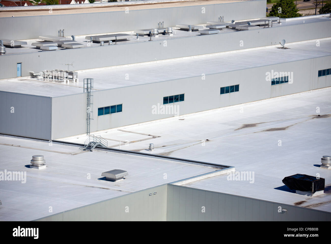 Roofs of the big warehouse Stock Photo - Alamy