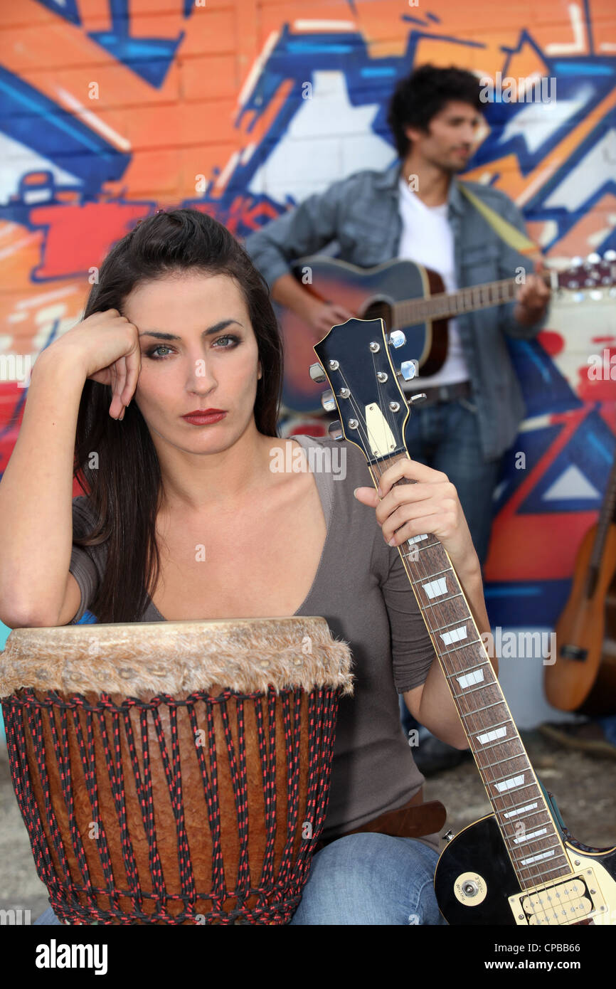 Couple playing musical instruments Stock Photo - Alamy