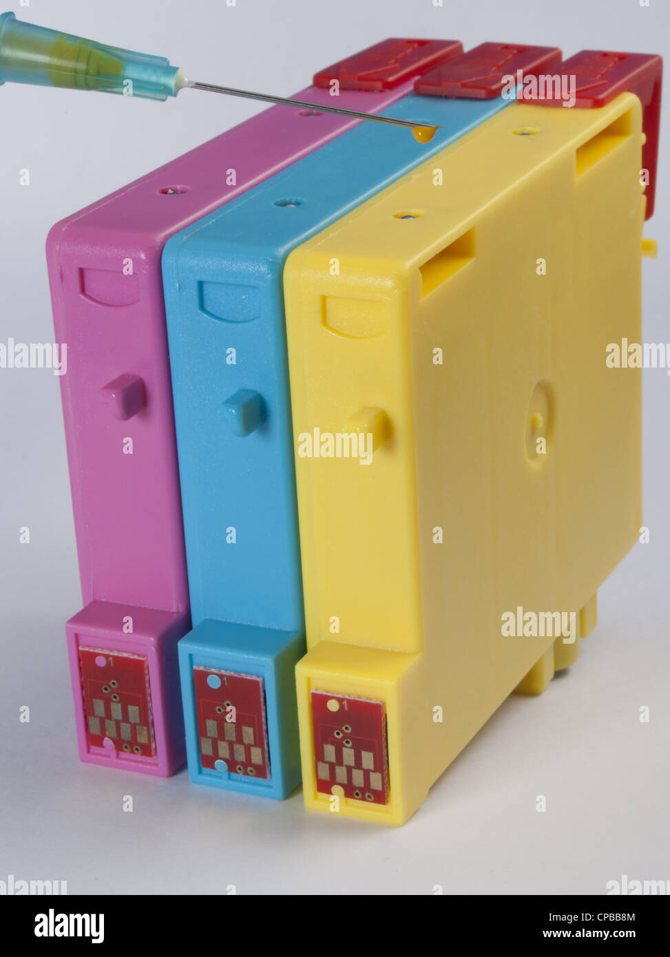 Ink filled syringe to fill ink cartridge Stock Photo - Alamy