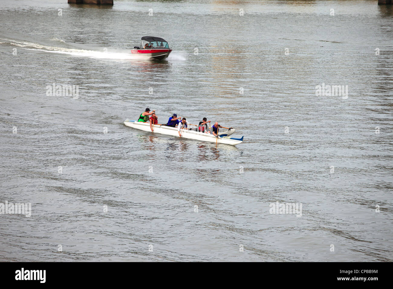 Men rowing a canoe for the annual competition Oregon Stock Photo - Alamy
