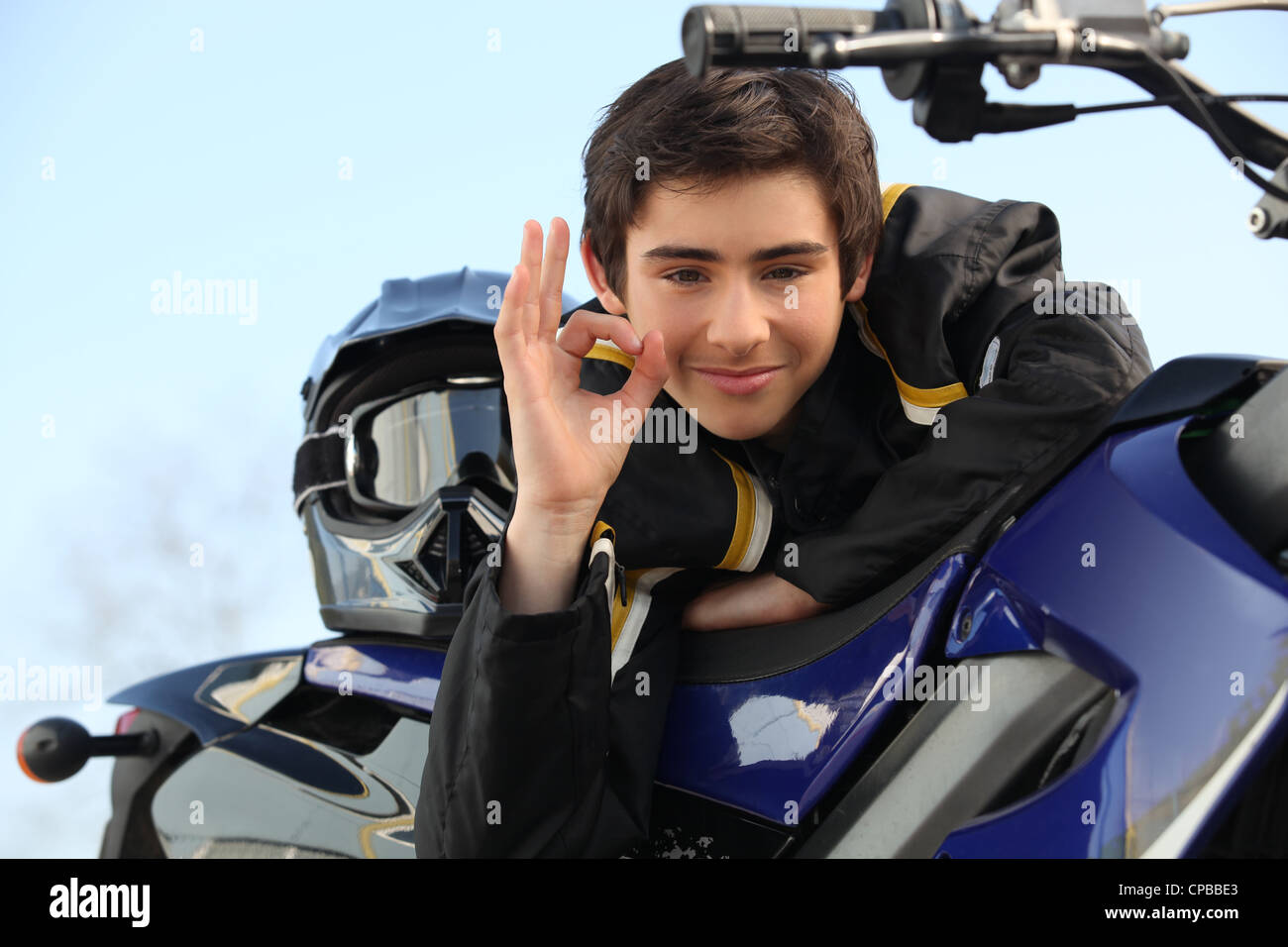 Boy with a motorbike Stock Photo - Alamy