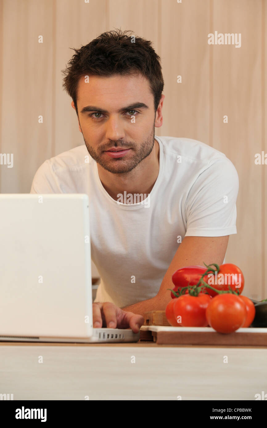 young man surfing the internet Stock Photo - Alamy
