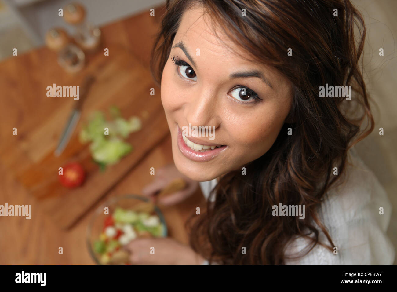 Pretty girl cooking, top view Stock Photo - Alamy