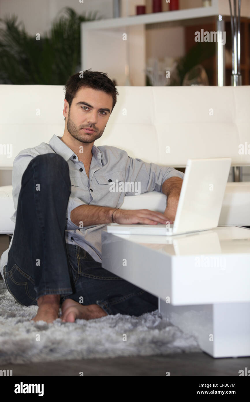 young man using computer Stock Photo - Alamy