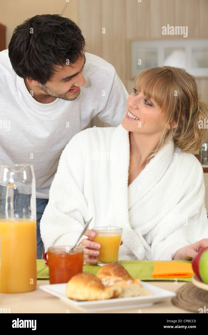 Couple having breakfast Stock Photo - Alamy