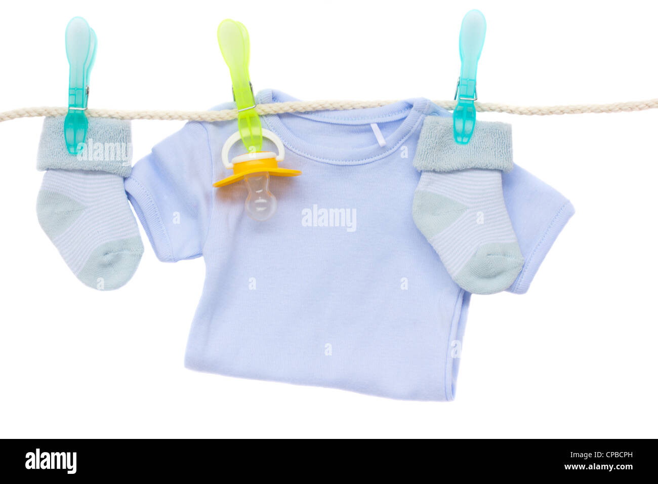 baby blue clothes hanging on rope Stock Photo - Alamy