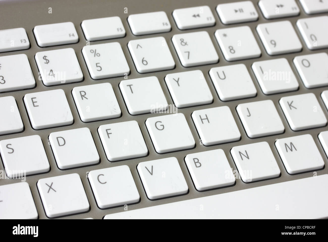 white and metalic modern keyboard with letters Stock Photo - Alamy