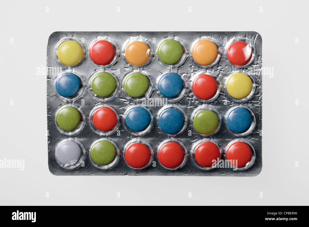 Brightly colored candies in blister pack looking like pills Stock Photo ...