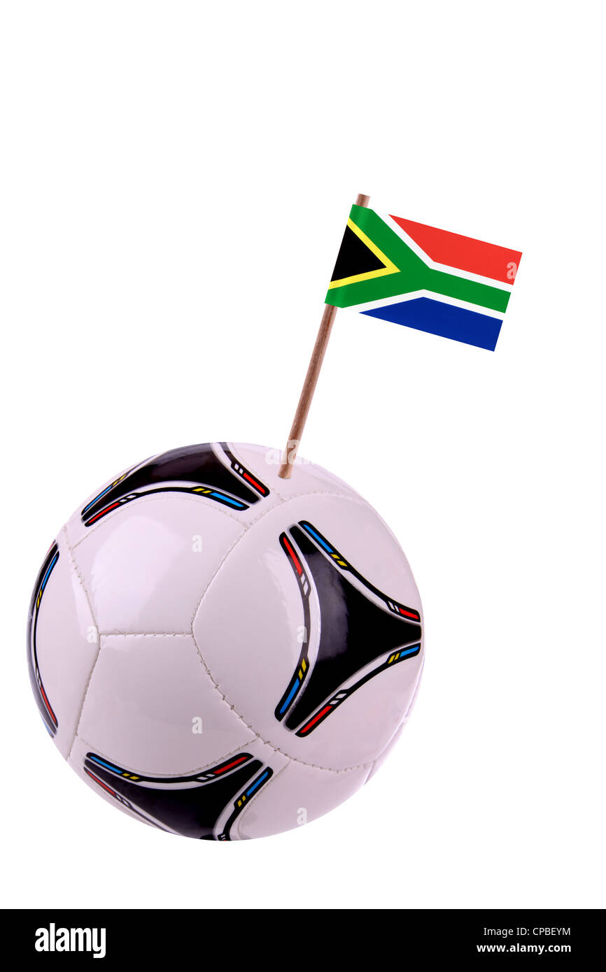 Soccerball or football decorated with a small national flag on a ...