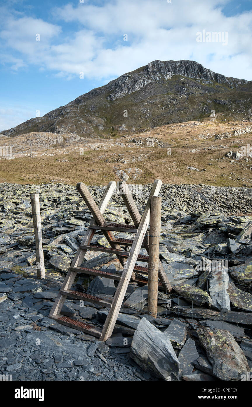 Wooden steps over fence on Mount Snowdon in North Wales Stock Photo - Alamy