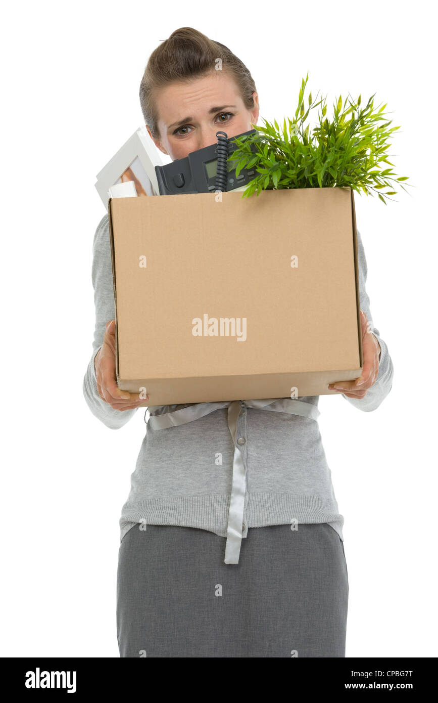 Fired woman employee hiding behind box with personal items Stock Photo ...
