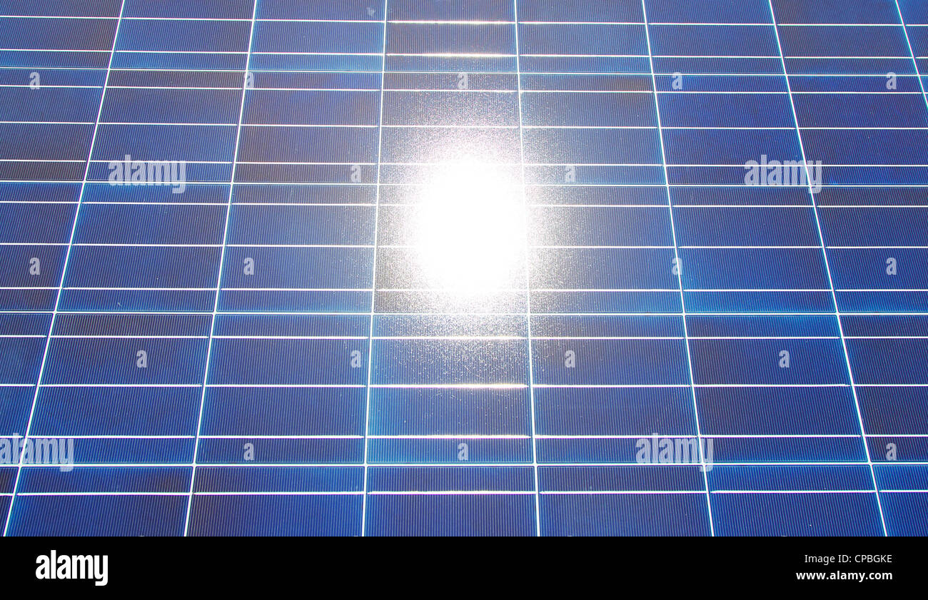 The bright sun reflecting in a solar panel Stock Photo - Alamy