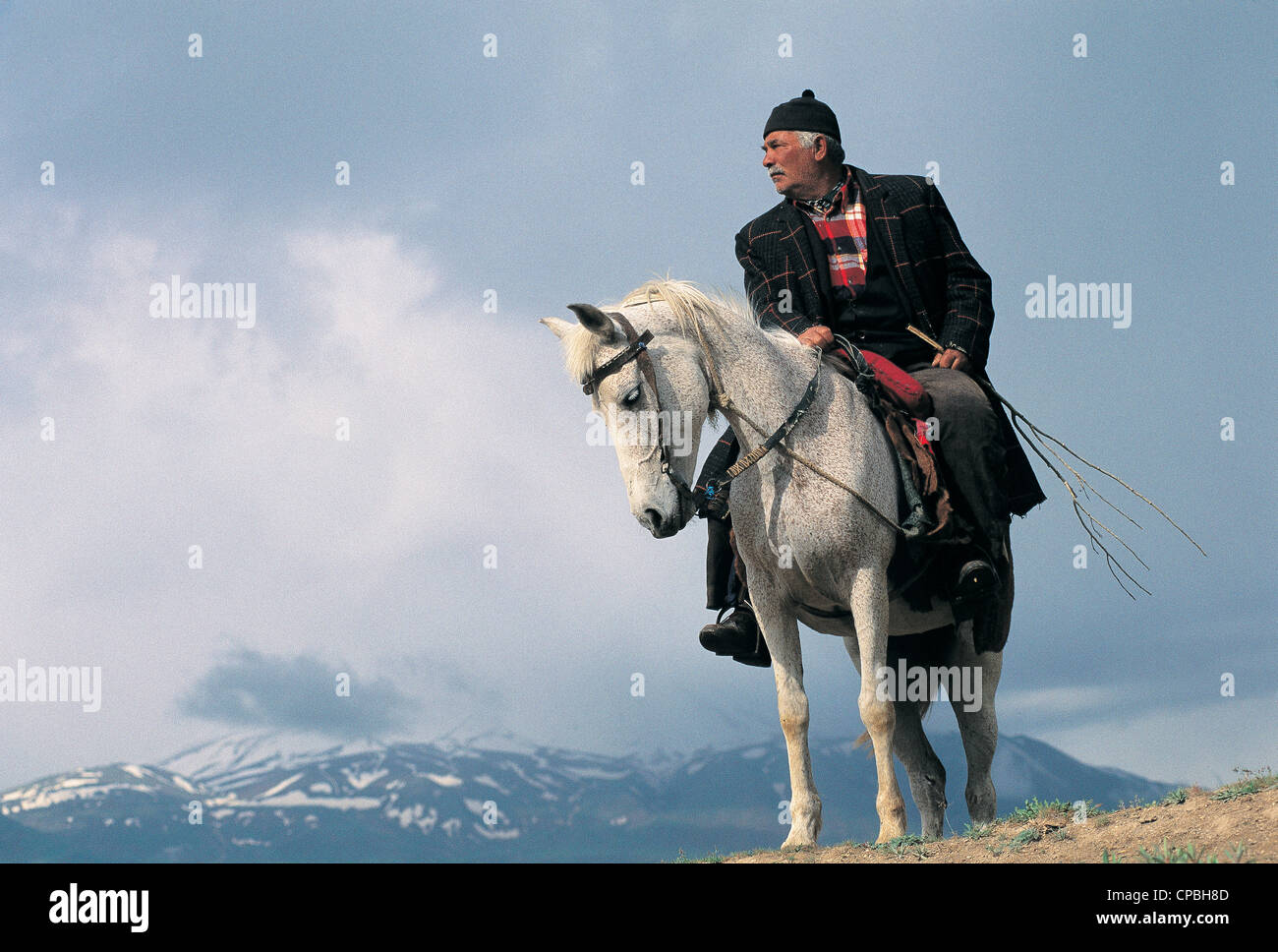 Man riding on a horse to highlands in summer Patnos Ağrı Turkey Stock ...