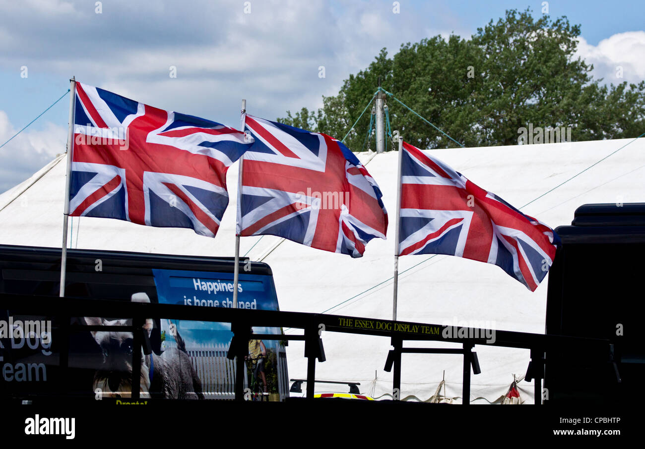 Three Union jacks flying in the wind Stock Photo - Alamy