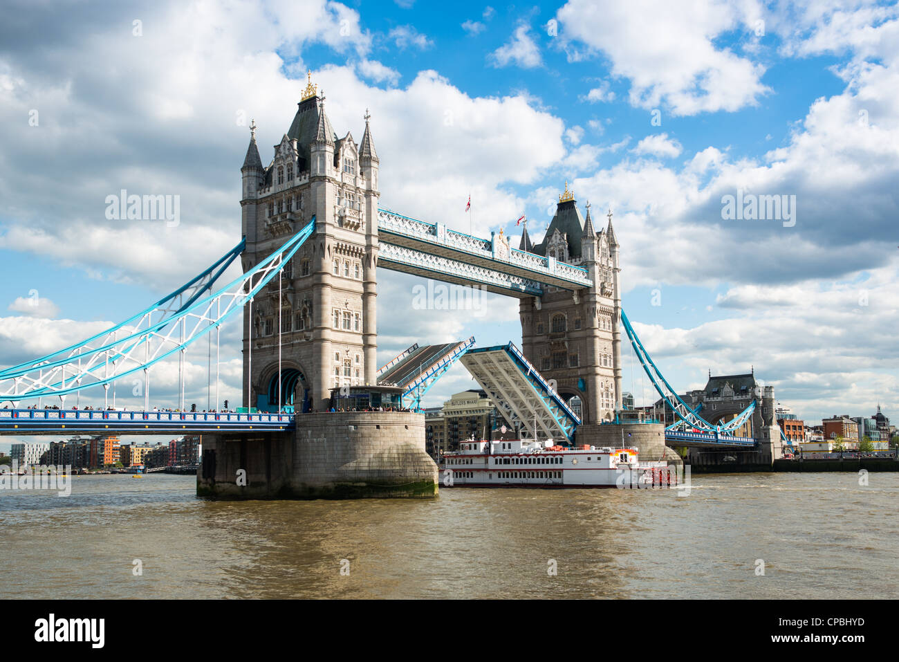 Tower bridge lifting to let boat pass through. London, England Stock ...