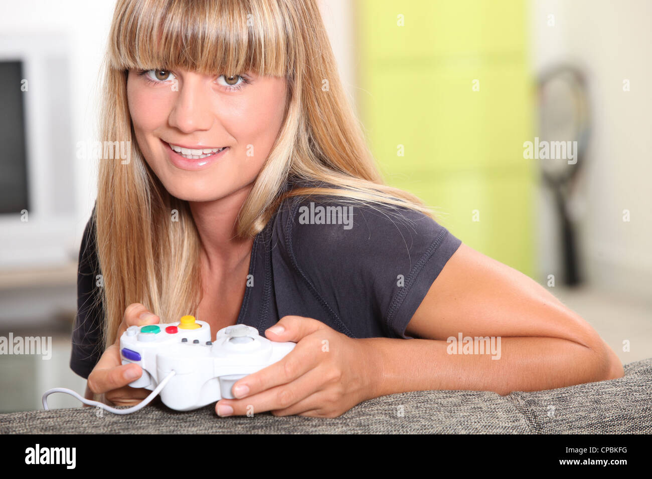 Girl playing computer games Stock Photo - Alamy